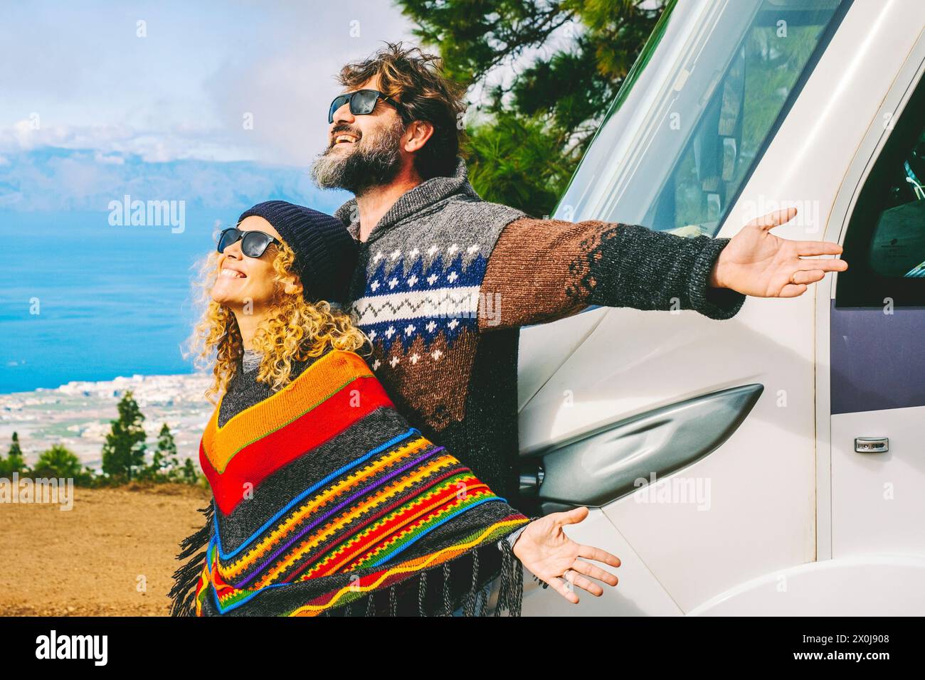 Van life and travel destination concept. Man and woman excited for new ...
