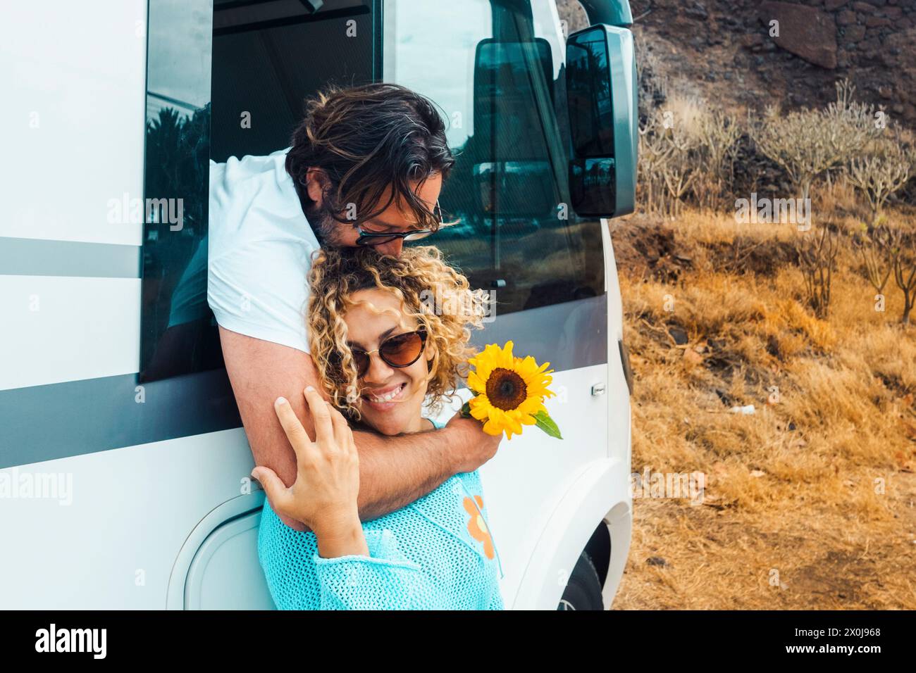 Happy traveler couple enjoy summer destination with camper van. Van ...