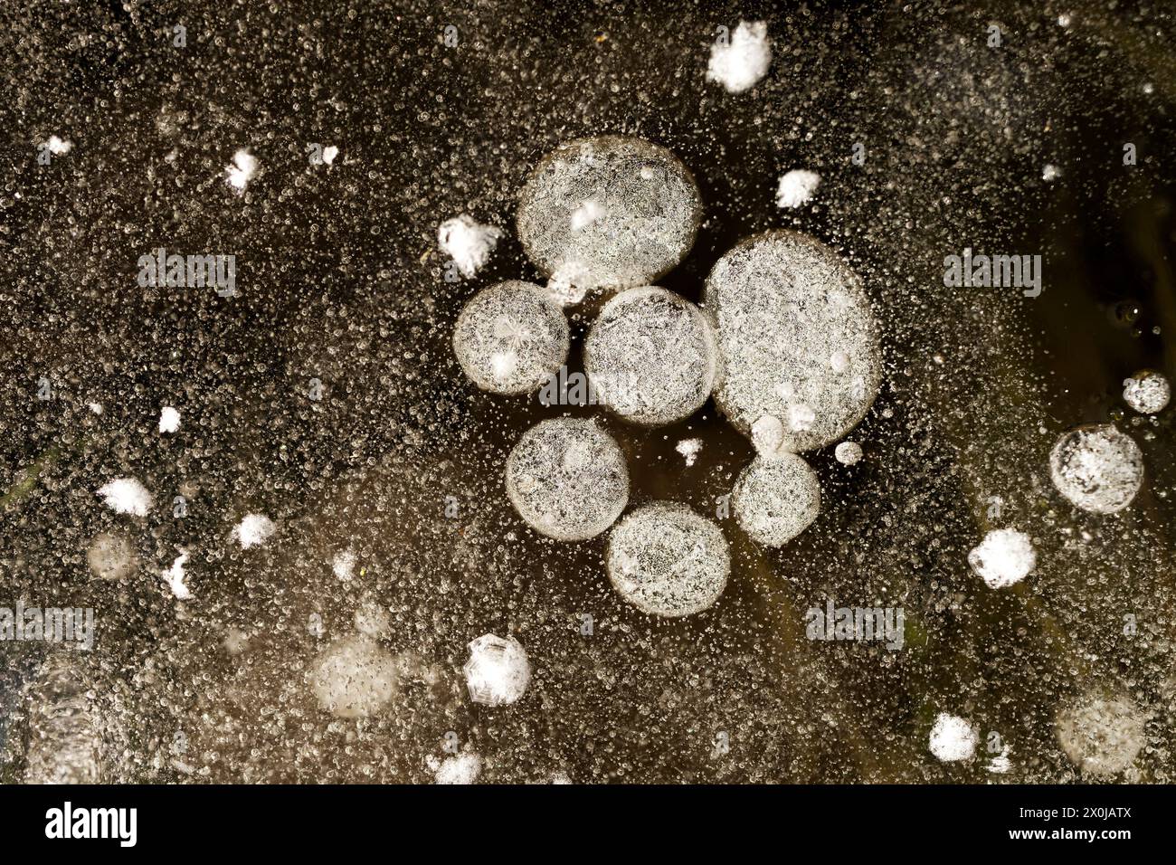 Air bubbles trapped in the ice, close-up, Germany Stock Photo - Alamy