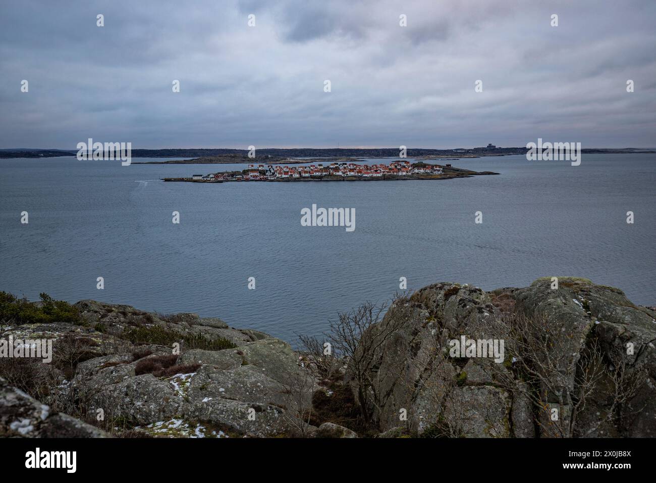 Landscape shot with a view of an island with typical Swedish houses ...