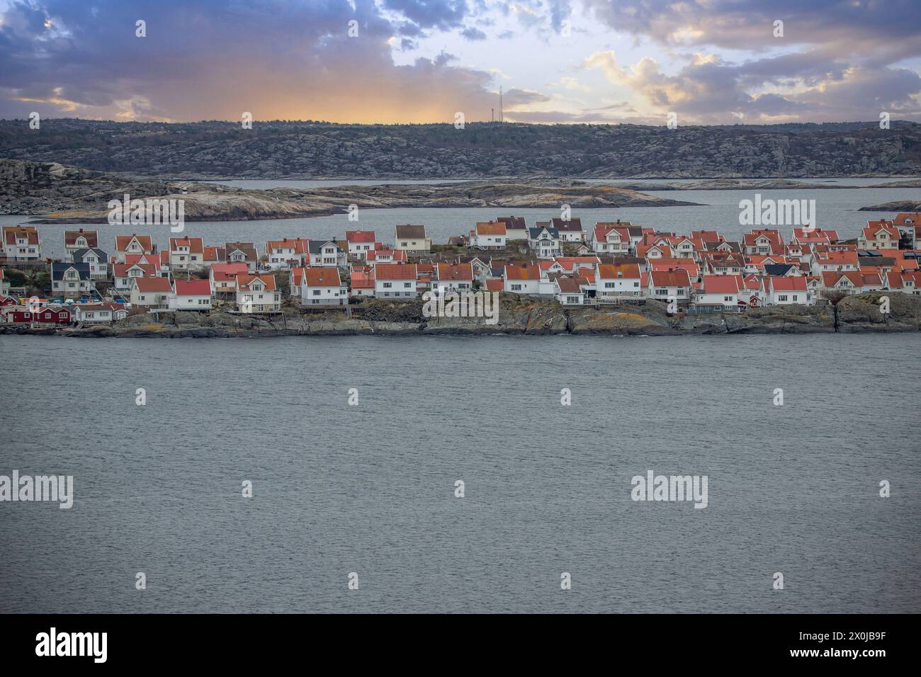 Landscape shot with a view of an island with typical Swedish houses ...