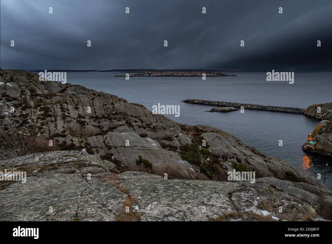 Landscape shot with a view of an island with typical Swedish houses ...