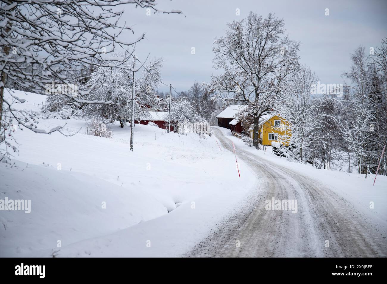 Typical Swedish house. Wooden house in a winter landscape with ice and ...
