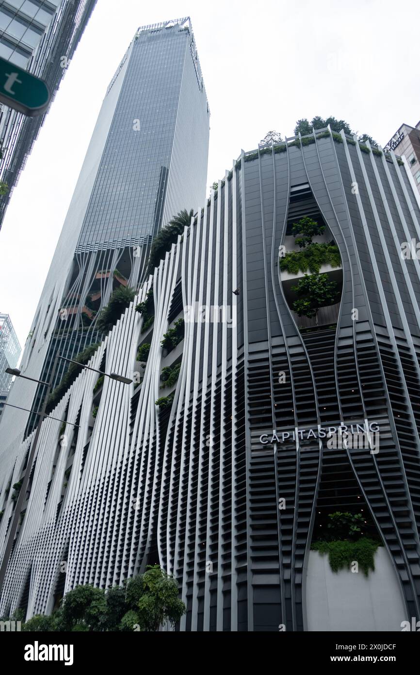 Singapore - 8 March 2024: Façade exterior of CapitaSpring Building. It ...