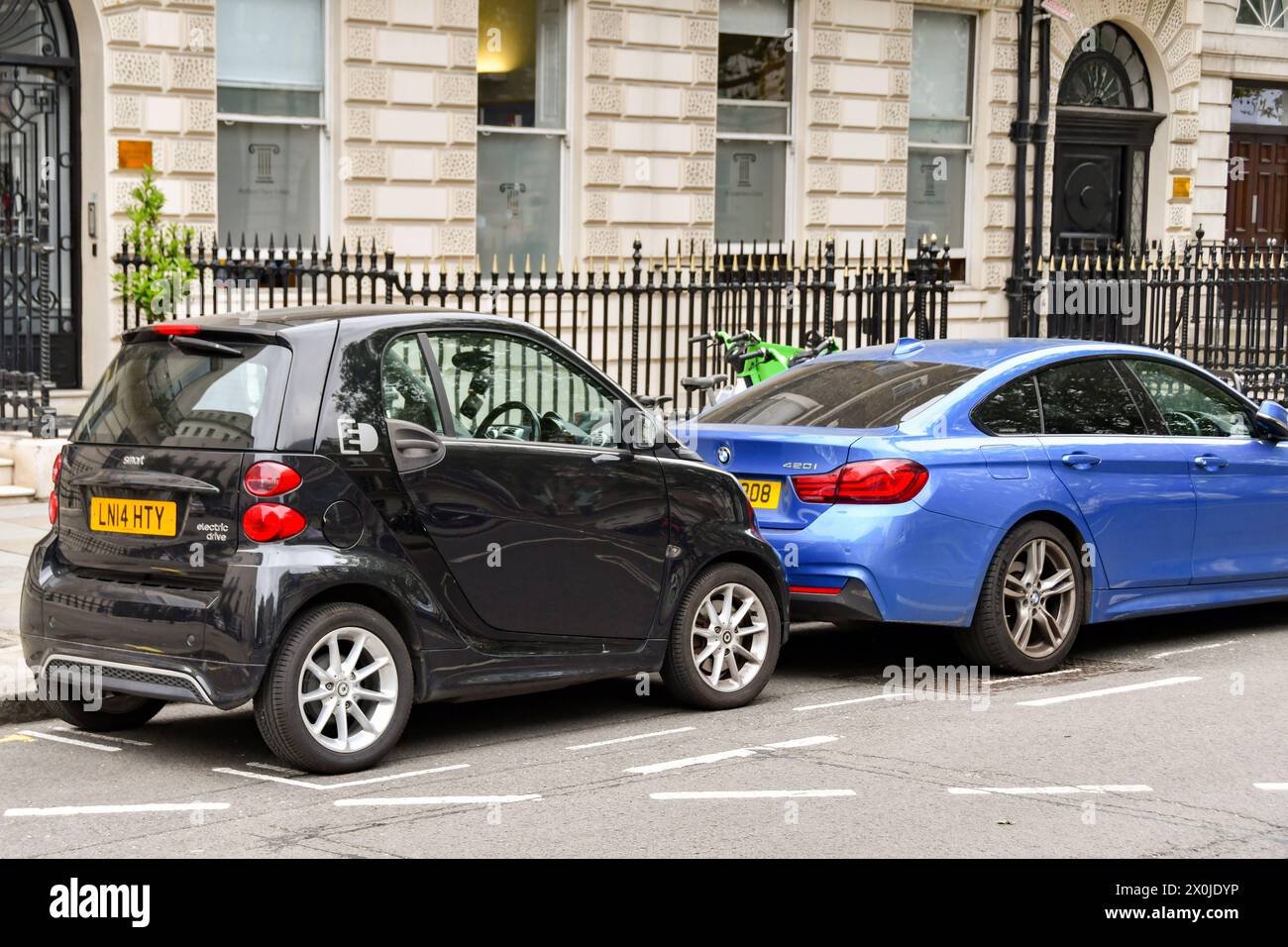 London, England, UK - 27 June 2023: Smart car using up a small space at ...