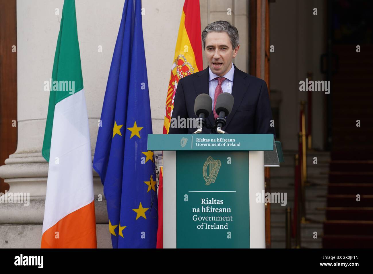 Taoiseach Simon Harris speaks to the media outside the Government ...