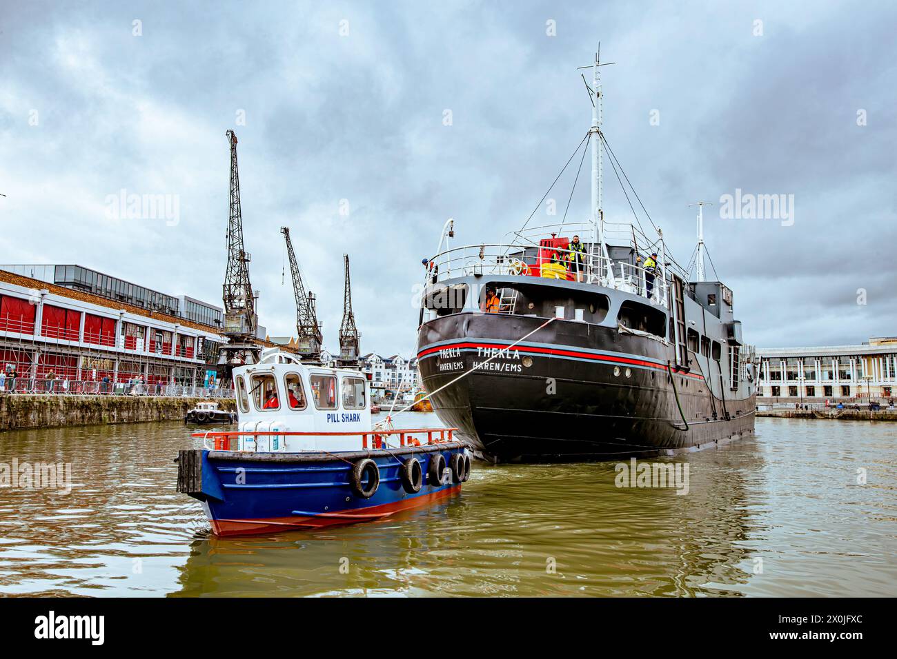 Thekla, being tugged through Bristol Harbour towards the Grove in 2019 ...