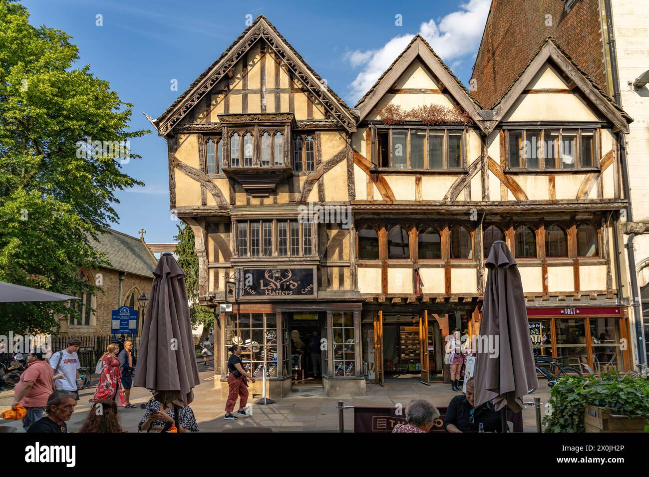 Half-timbered house with hat store Laird Hatters on Cornmarket Street ...