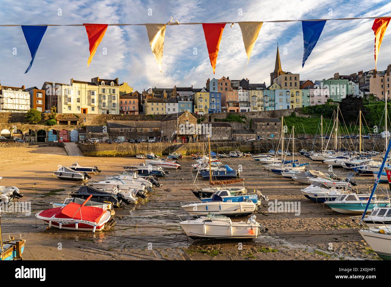 Town view with the harbor at low tide, Tenby, Wales, Great Britain ...