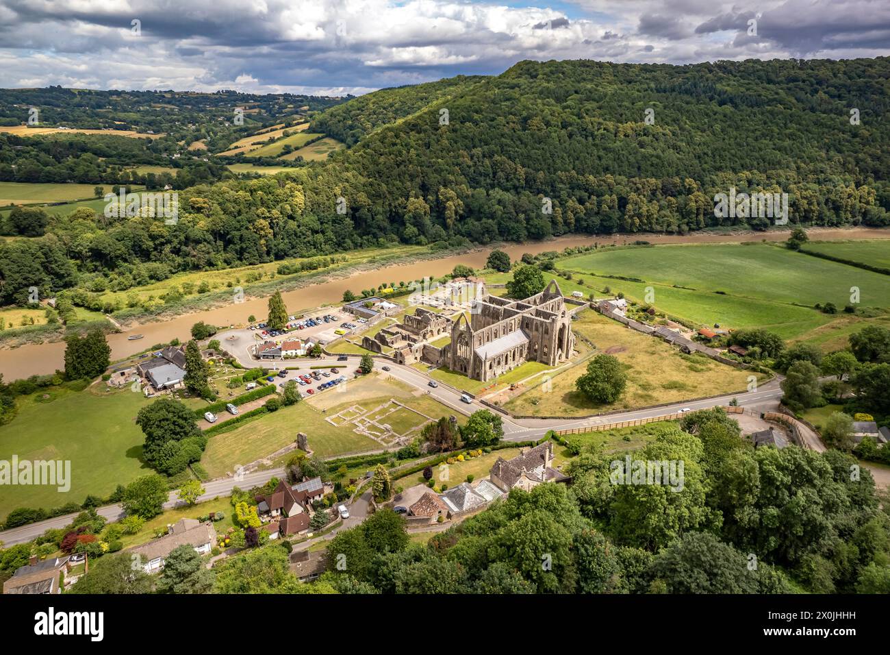 The ruins of Tintern Abbey and the Wye Valley landscape seen from the ...
