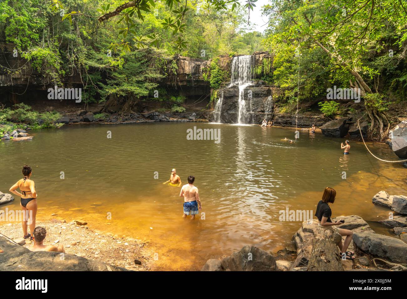 Tourists swimming at the Klong Chao waterfall on the island of Ko Kut ...