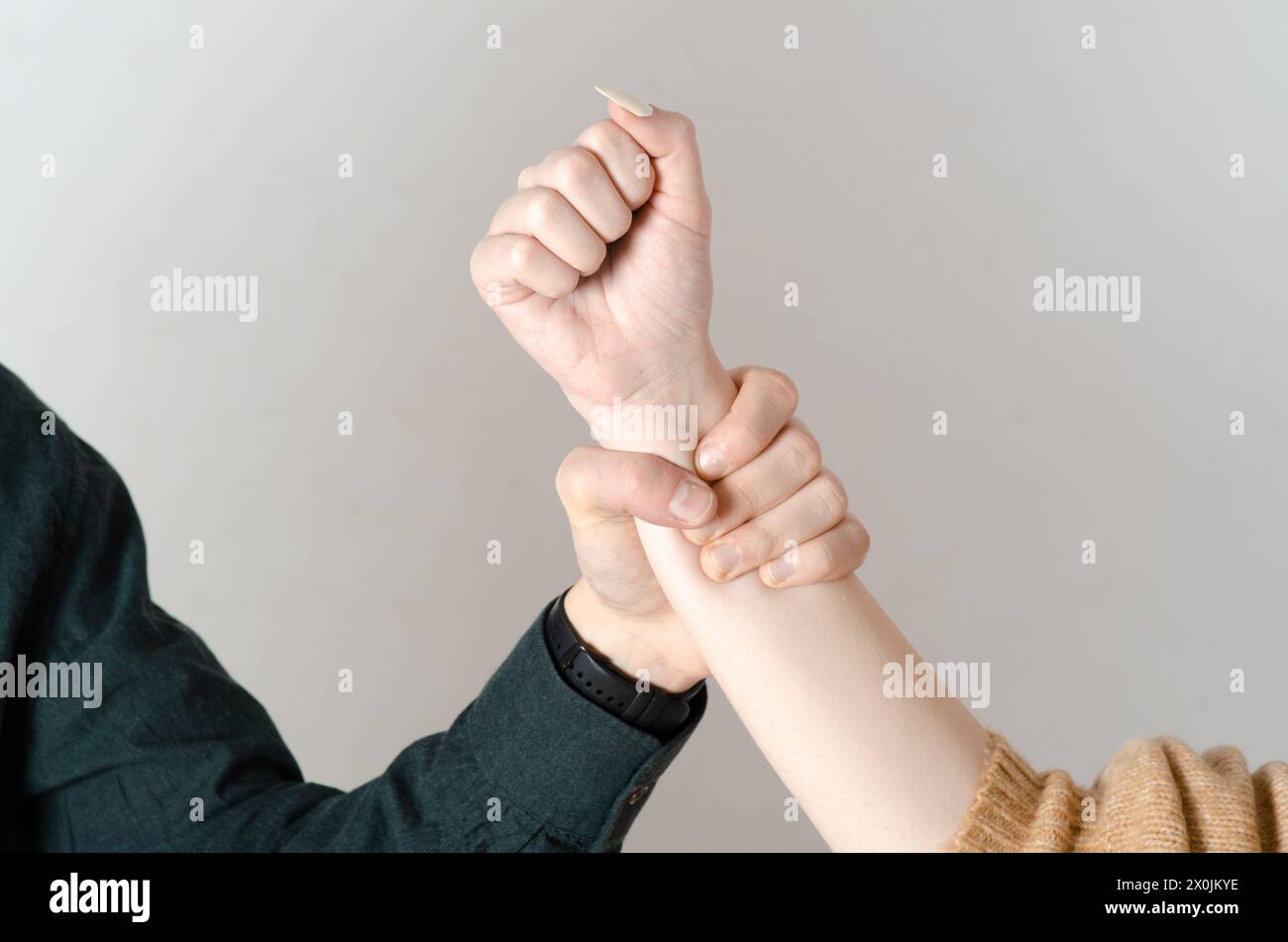 Grabbing arm abuse hi-res stock photography and images - Alamy