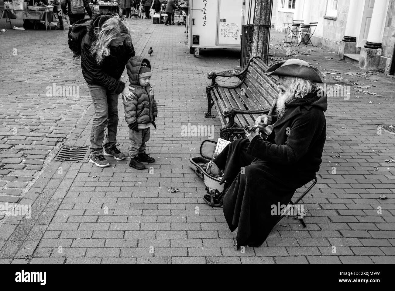 A Child Nervously Watches A Pirate Street Entertainer In The High ...