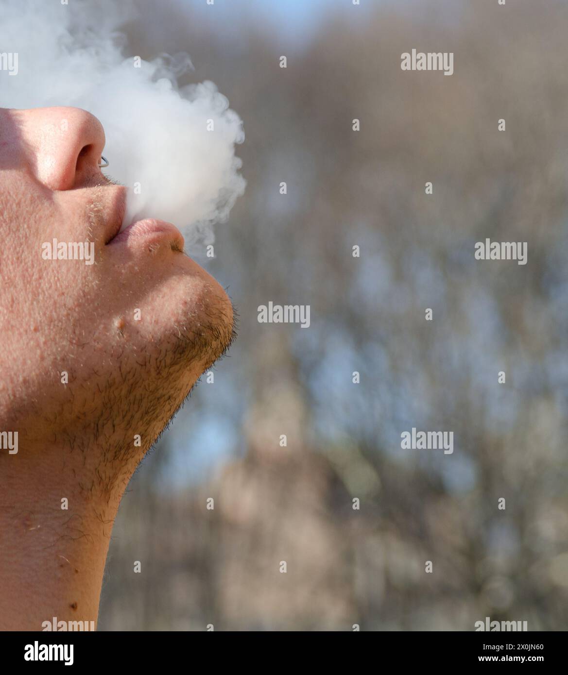 Man cigarette in mouth young hi-res stock photography and images - Alamy