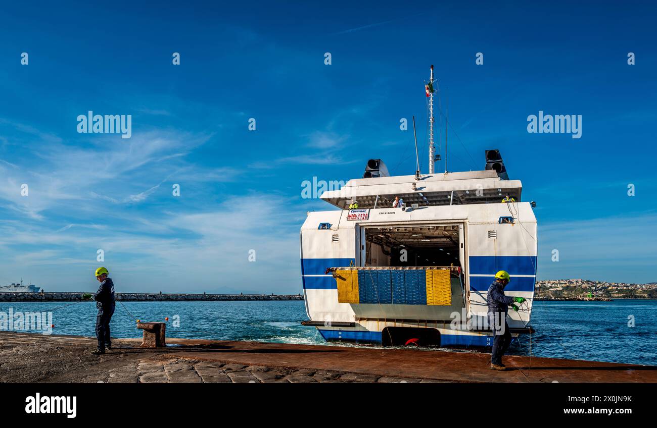 The Caremar ferry Isola di Vulcano arriving in Procida, Bay of Naples ...