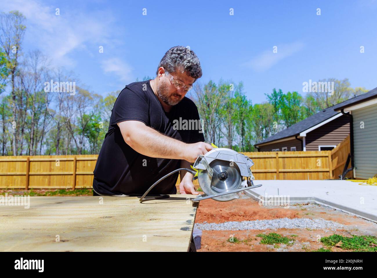 Carpenter sawing angles wooden board hi-res stock photography and ...