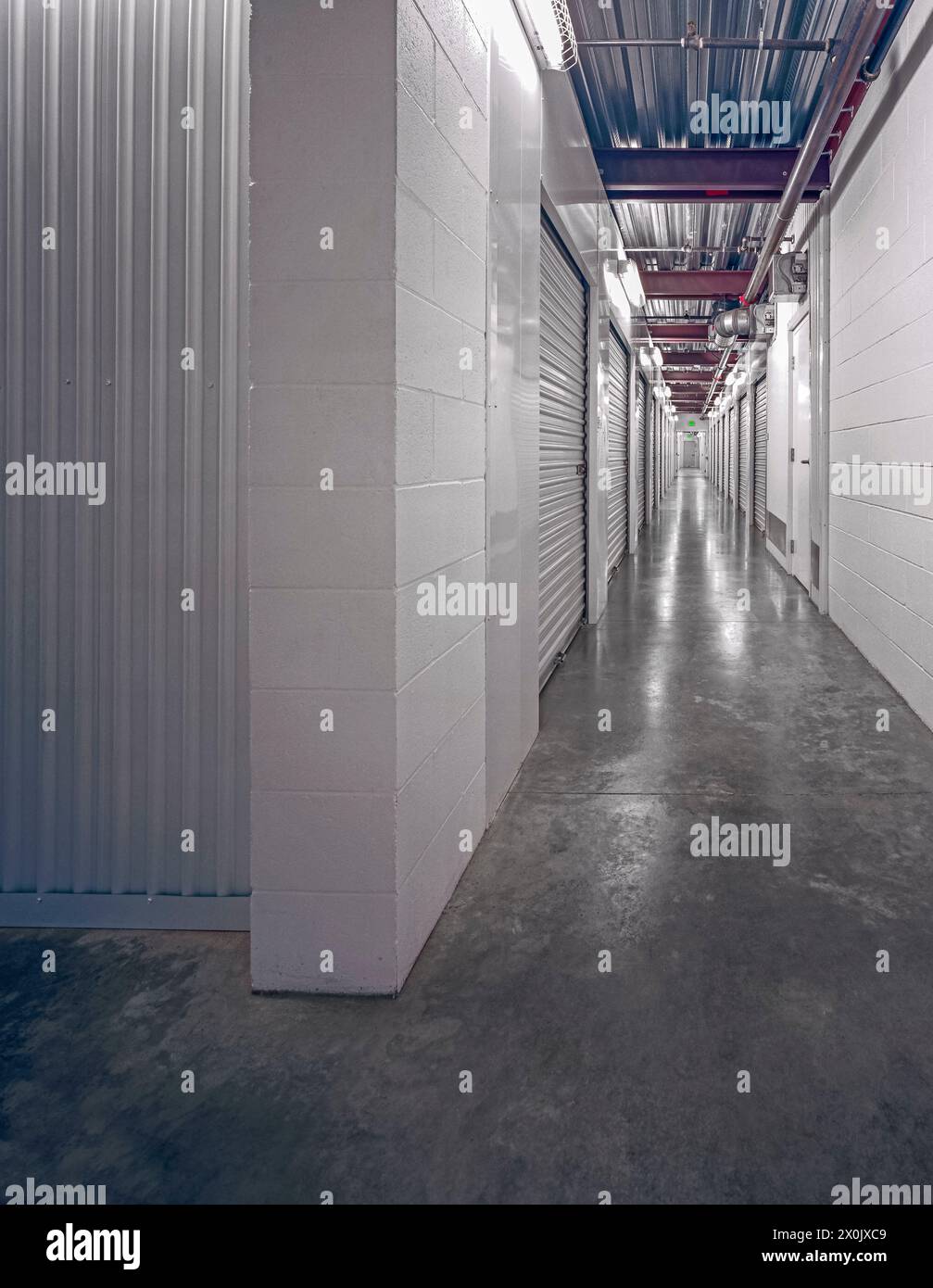 Storage Rental Space Interior showing doors to storage units down ...