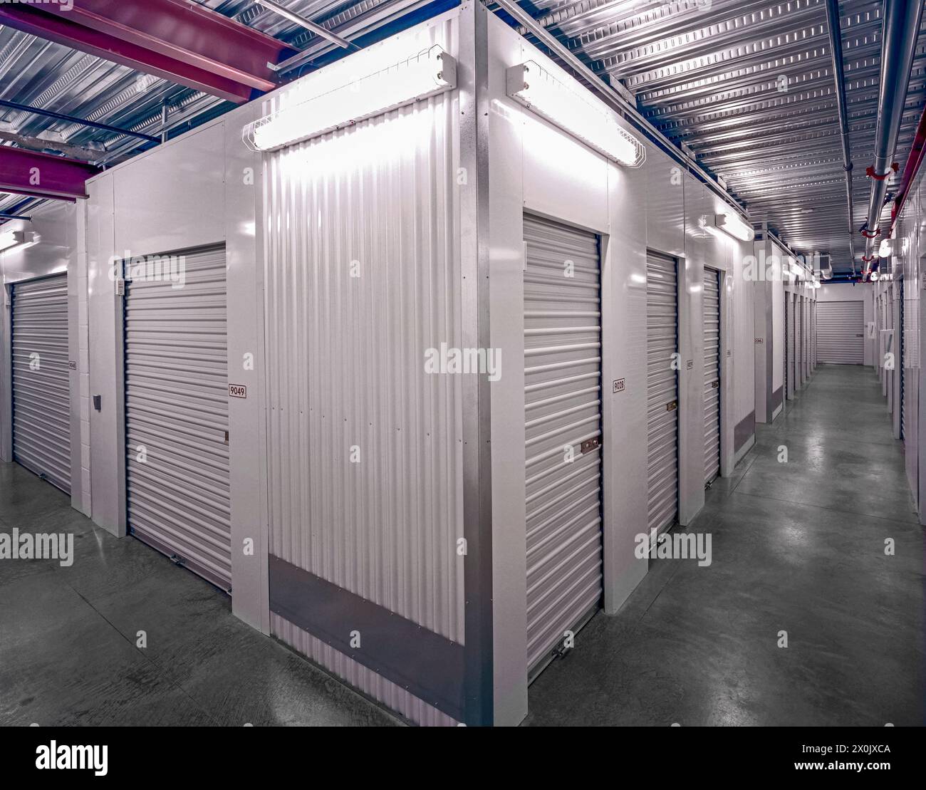 Storage Rental Space Interior showing doors to storage units down ...