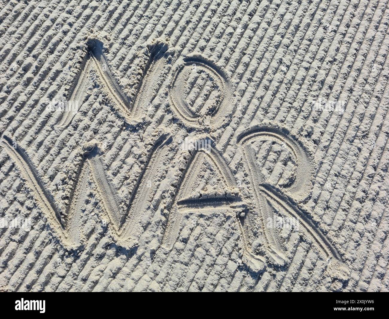 no war, letters written in the sand Stock Photo - Alamy