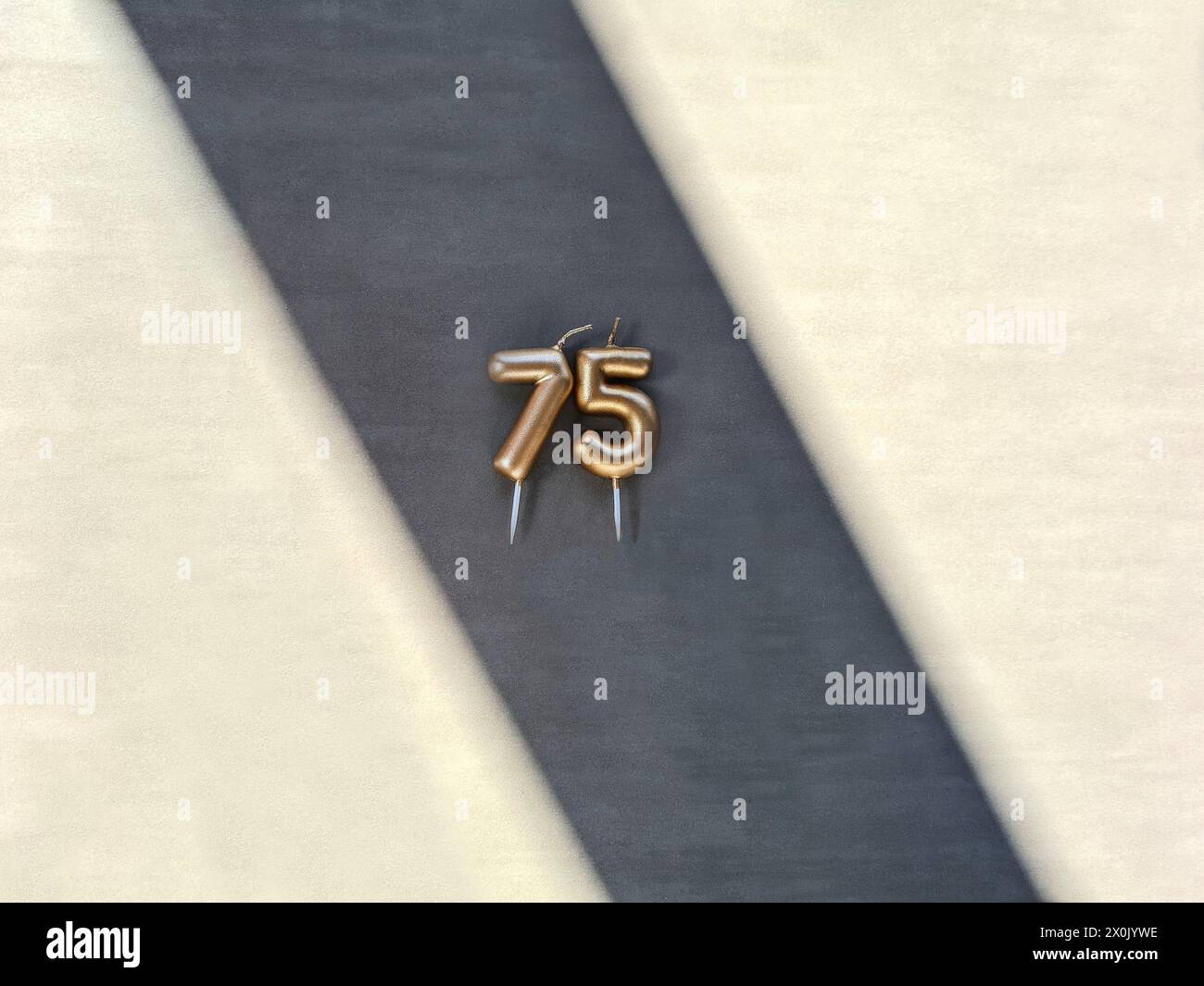 The number 75 as symbol its meaning with light shadow hi-res stock ...