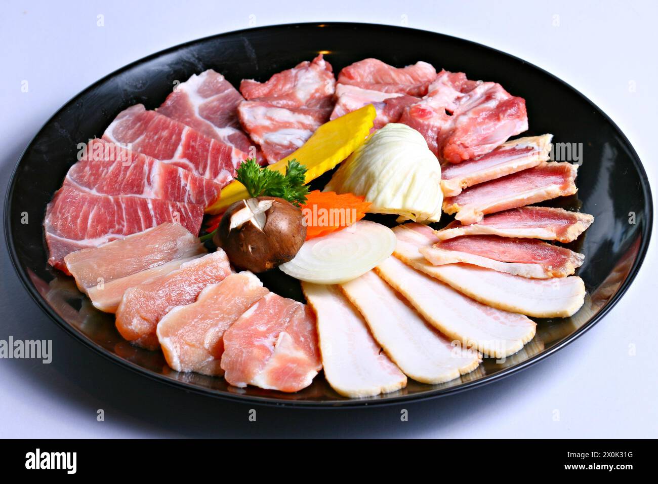 Set includes various parts of pork for yakiniku (grilled on charcoal ...