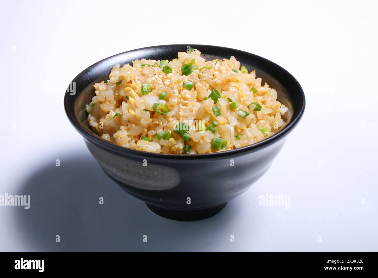 Japanese Garlic Fried Rice. Japanese food style in white background ...