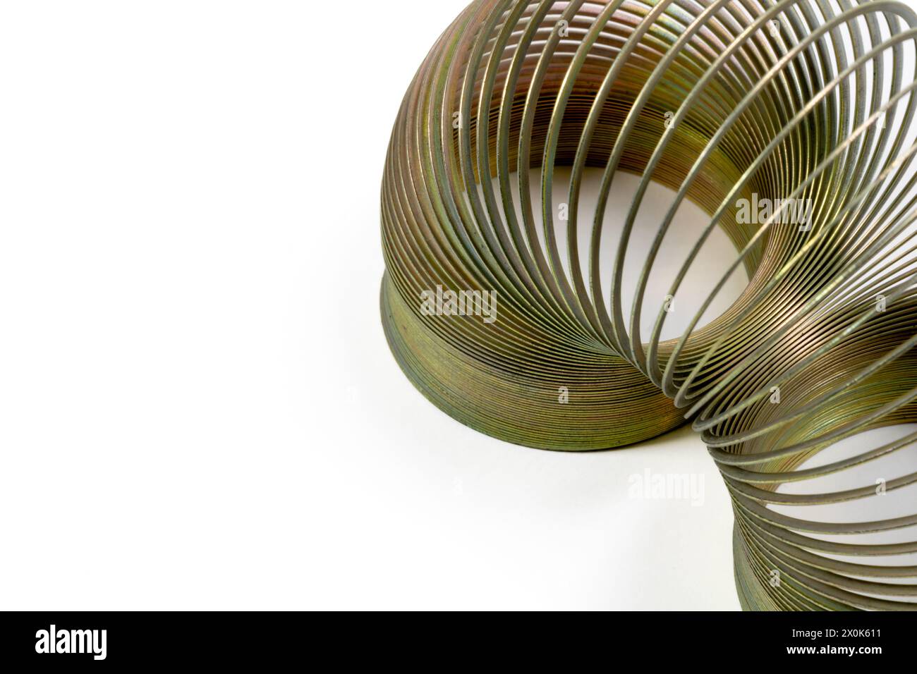 Closeup of metal wire spiral toy isolated on white background Stock ...
