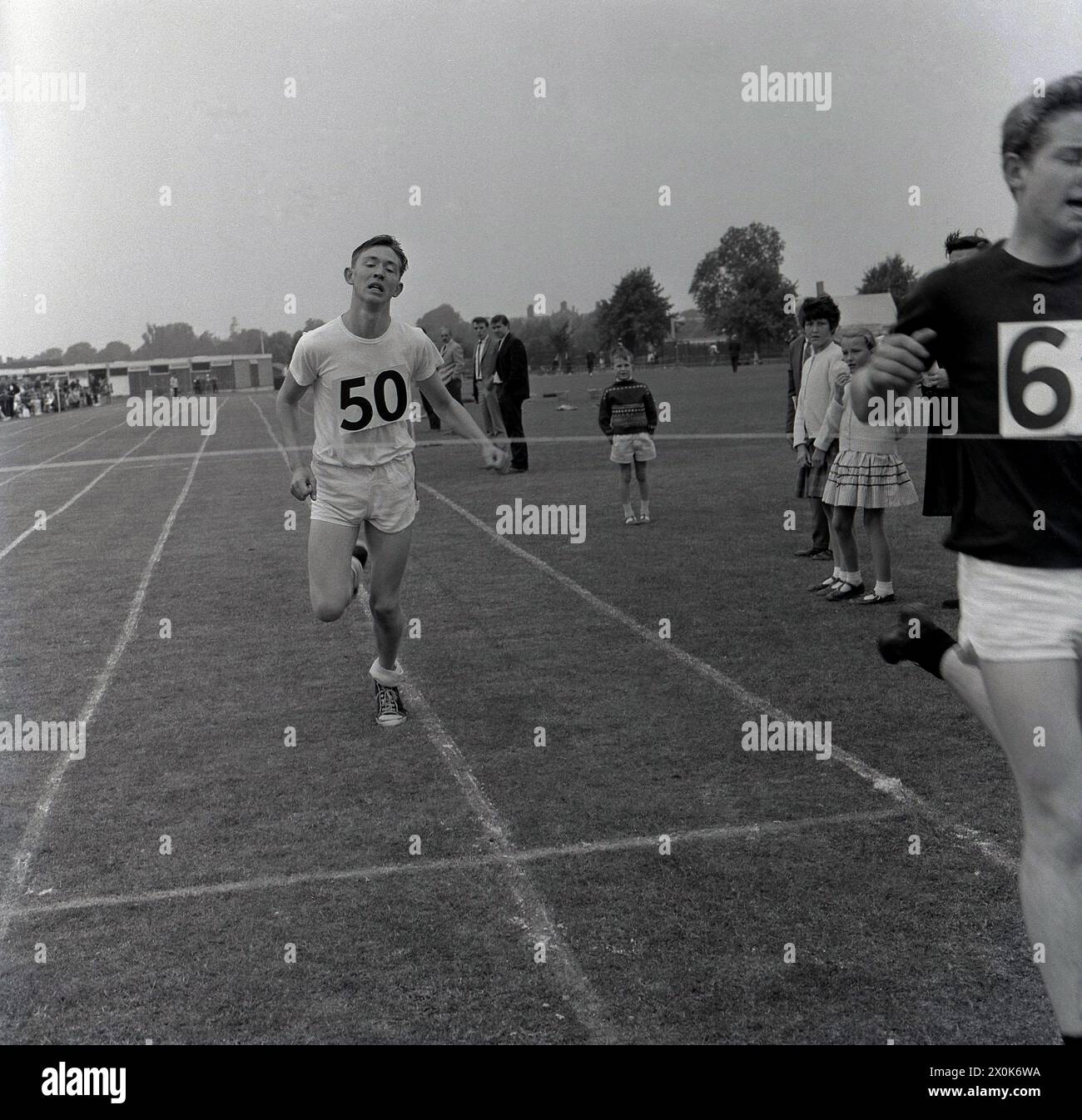 1964, historical, a cadets race, young men competing in a running race ...