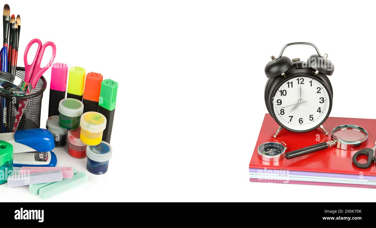 Set of school supplies isolated on white background. Wide photo. There ...