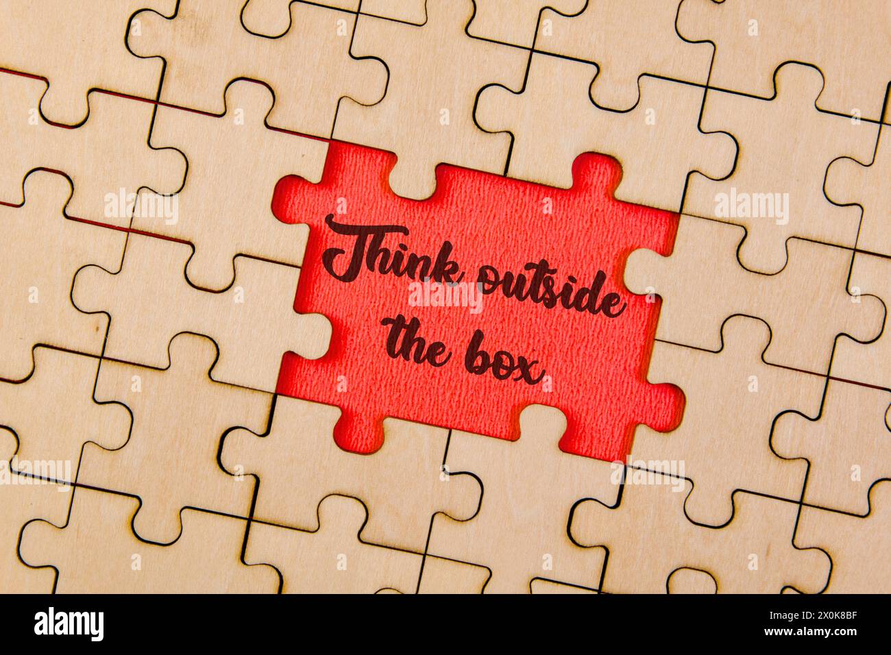 Interconnected jigsaw puzzle pieces coming together to create the ...