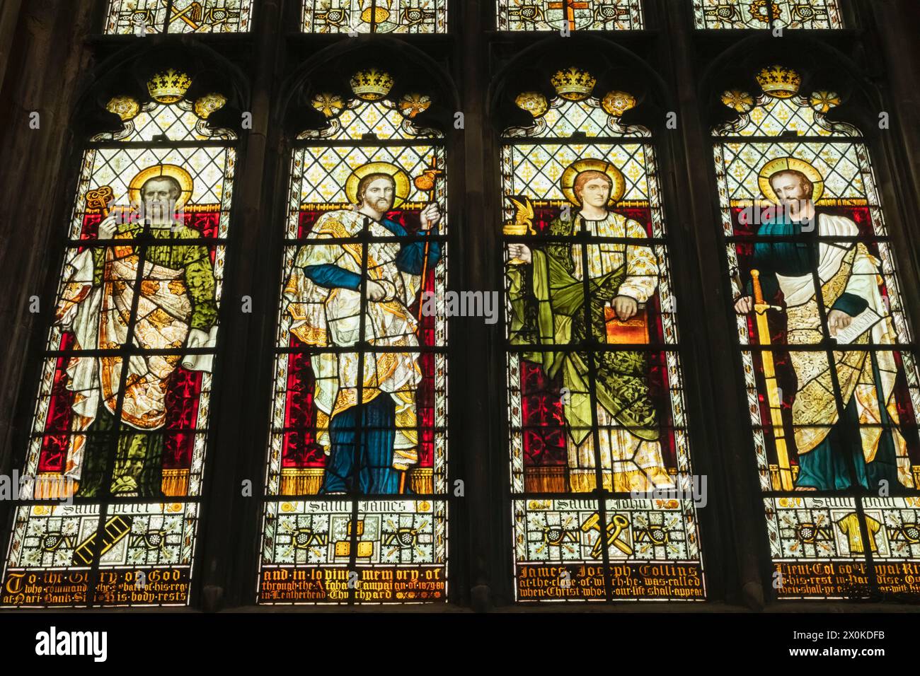 Interior view of stained glass window depicting saints hi-res stock ...