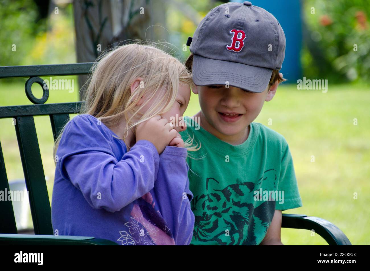 Two friends share story time at the community garden camp, Yarmouth ME ...