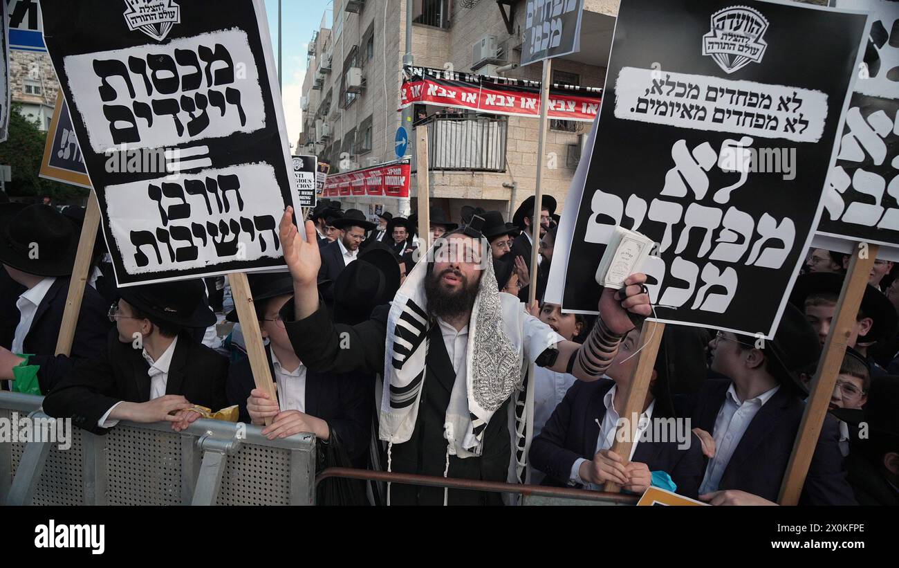 A Haredi Jew wrapped with Talit shawl and Tefillin, or phylacteries ...
