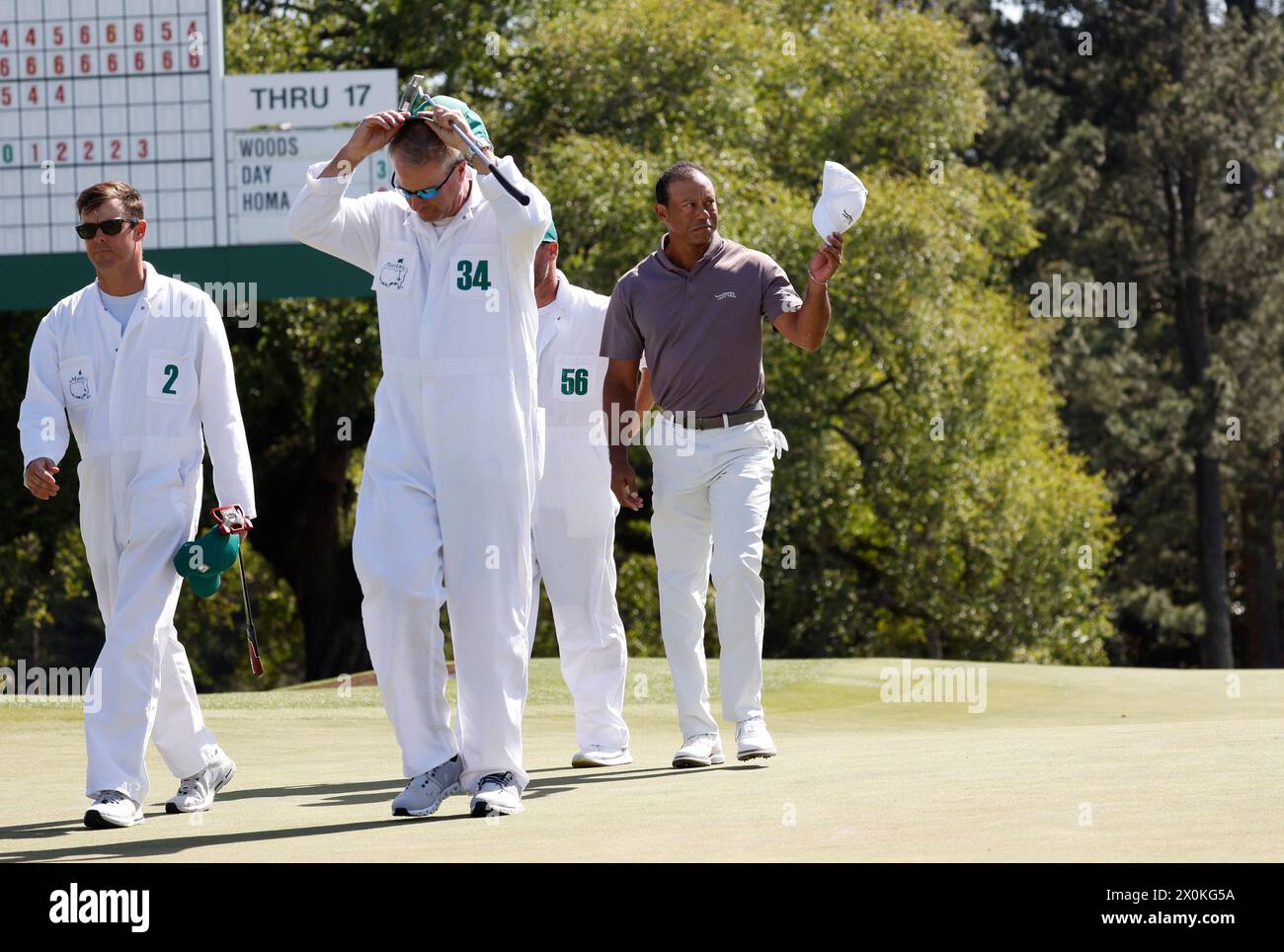 Augusta, United States. 12th Apr, 2024. Tiger Woods waves as he walks ...