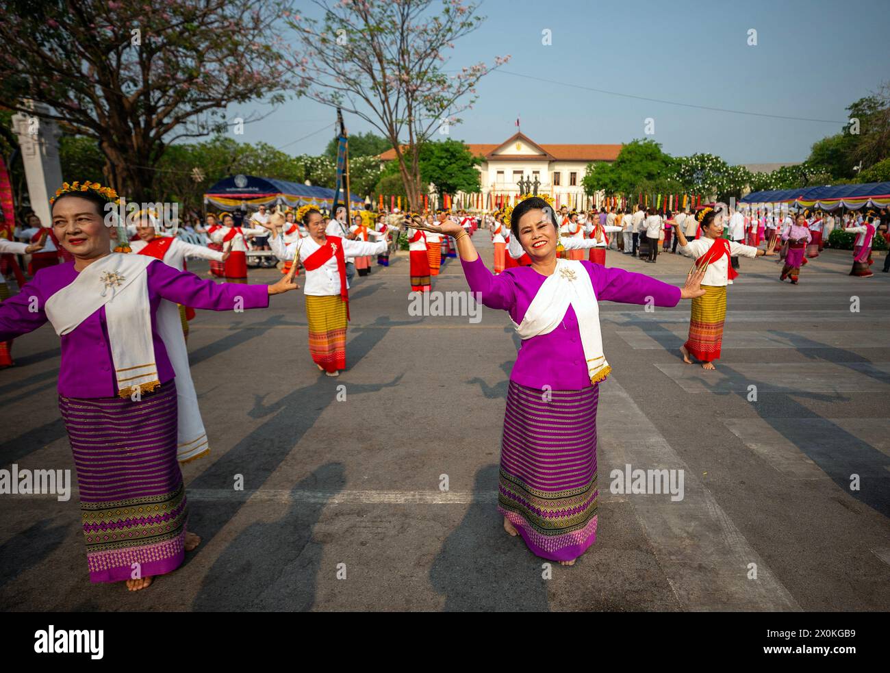 Thai performers wearing traditional costumes perform Thai Lanna dance ...