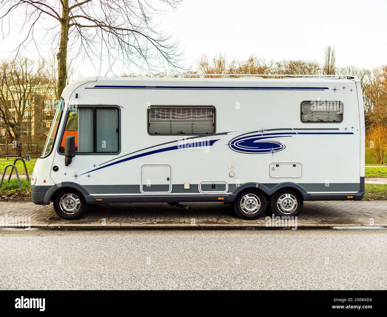 Caravan parked on the roadside Stock Photo - Alamy