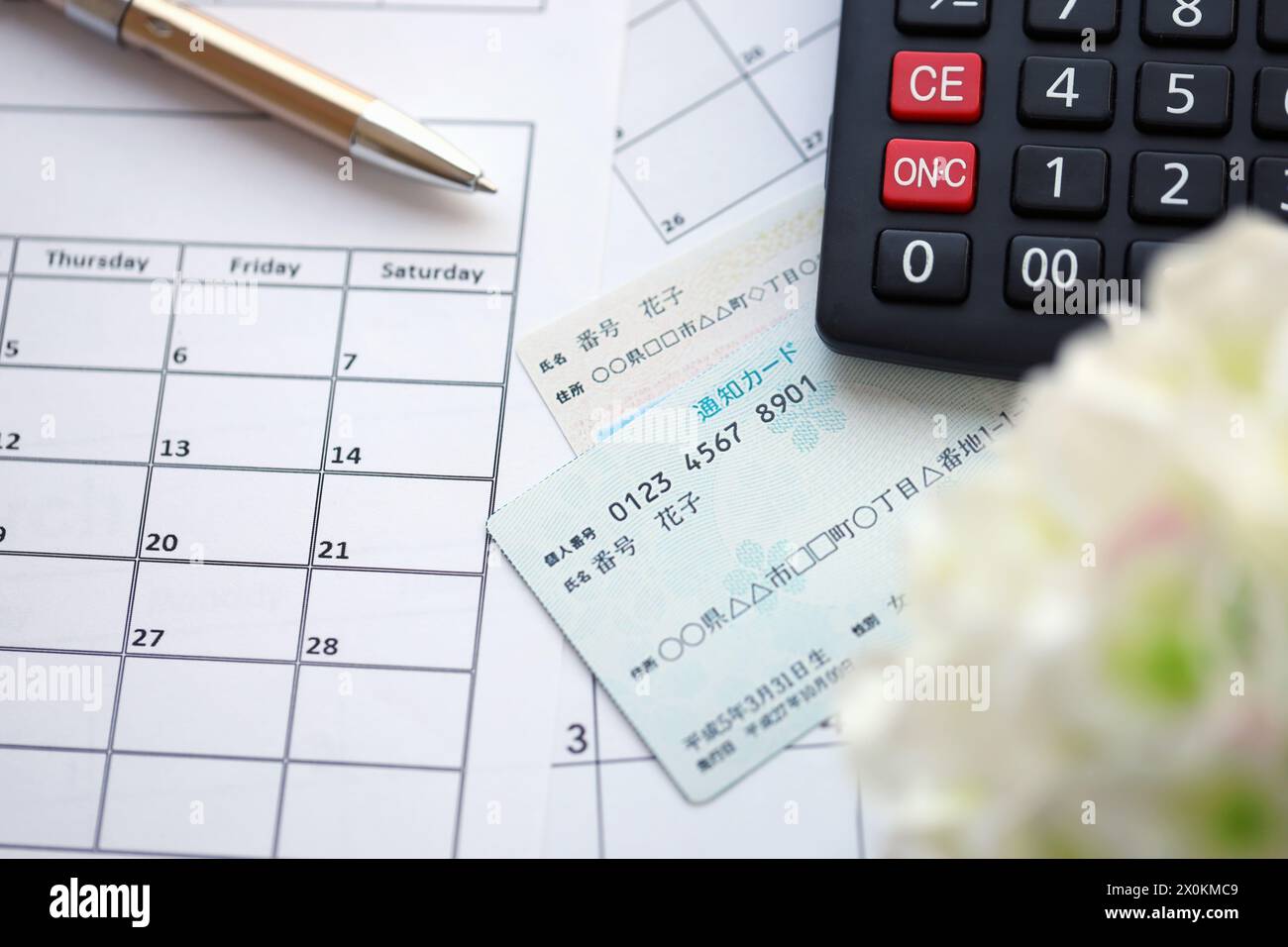 Japanese my number card specimen and notification card on calendar ...