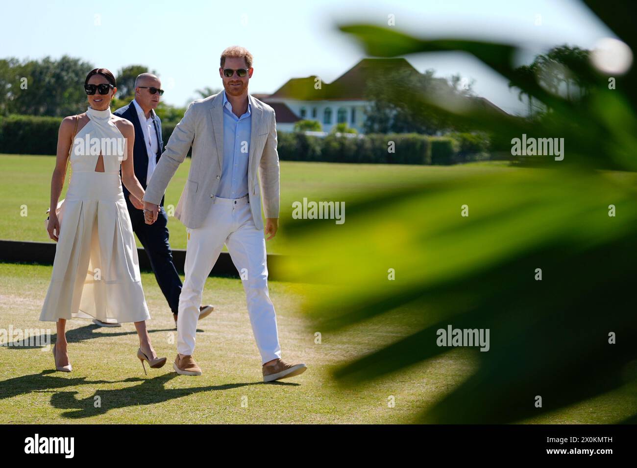 Britain's Prince Harry and wife Meghan Markle, Duchess of Sussex, arrive for the 2024 Royal ...