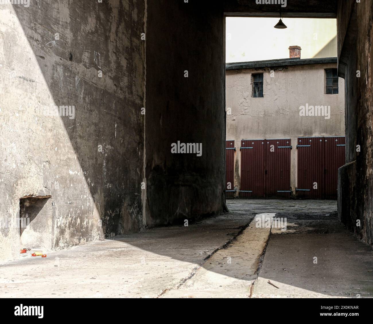 Courtyard entrance, old backyard with garages Stock Photo - Alamy