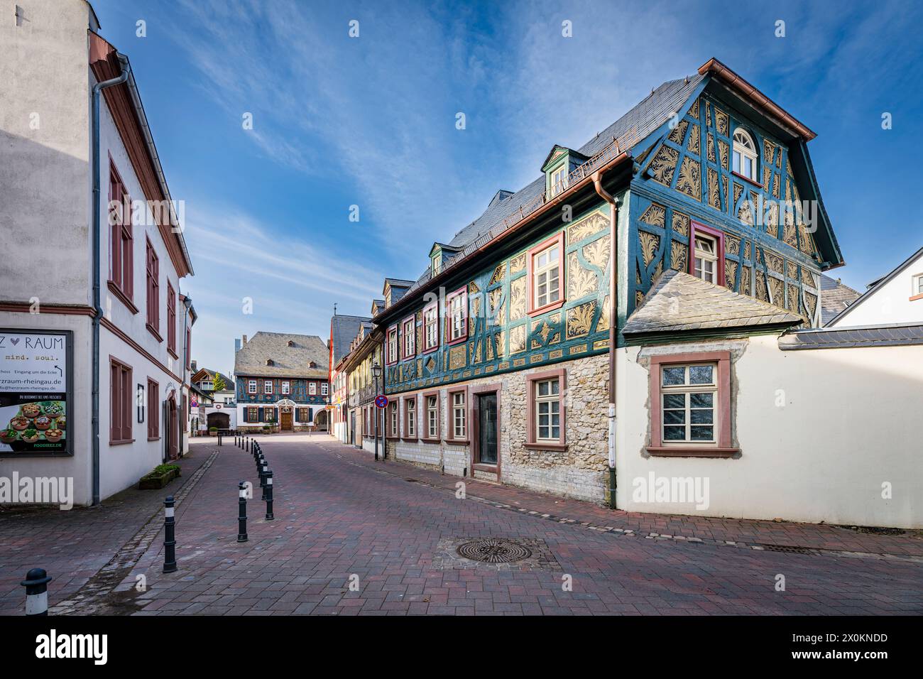 Main street in Hattenheim (Rheingau) with historic half-timbered houses ...