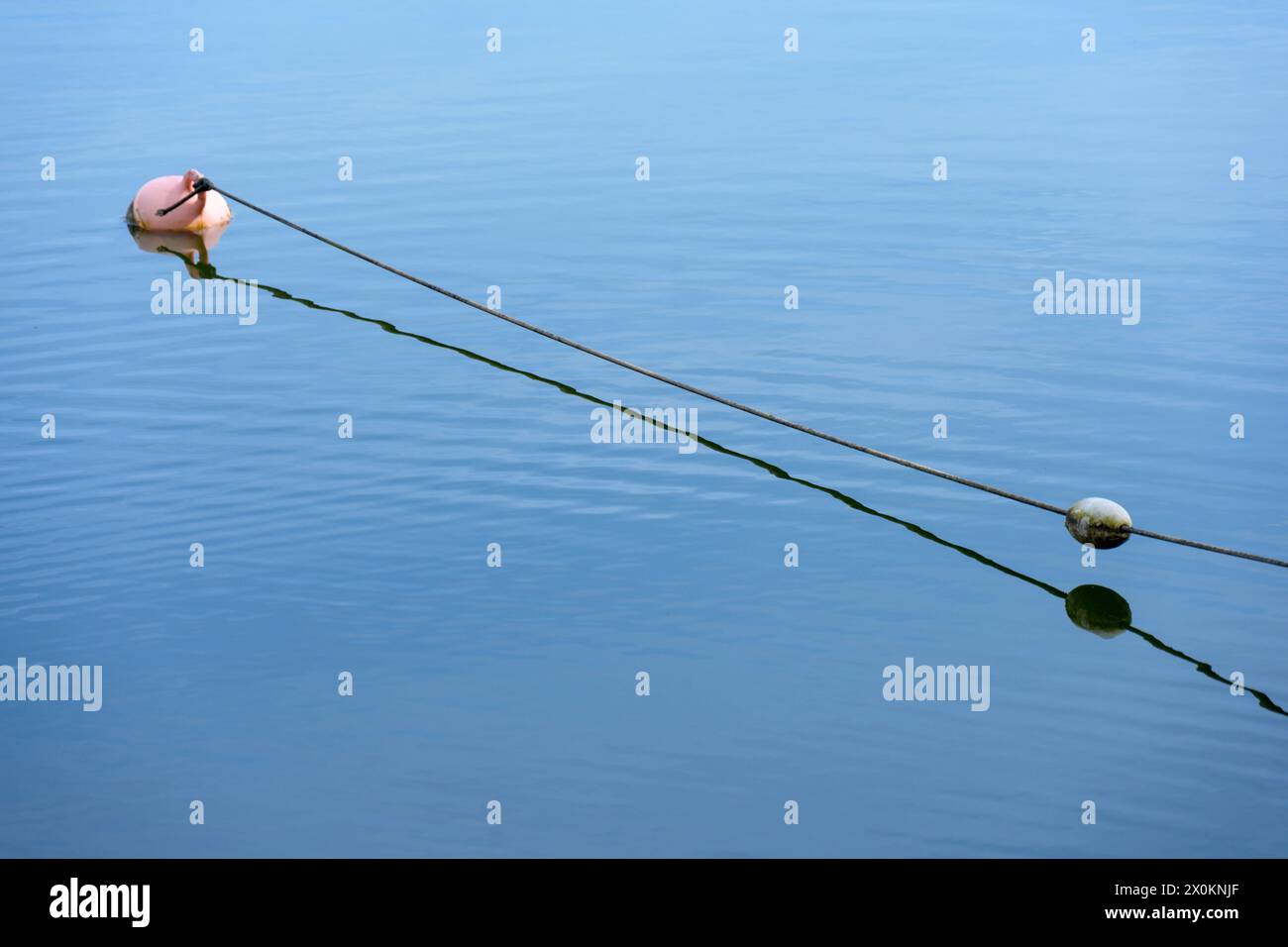Red floating buoy Stock Photo - Alamy