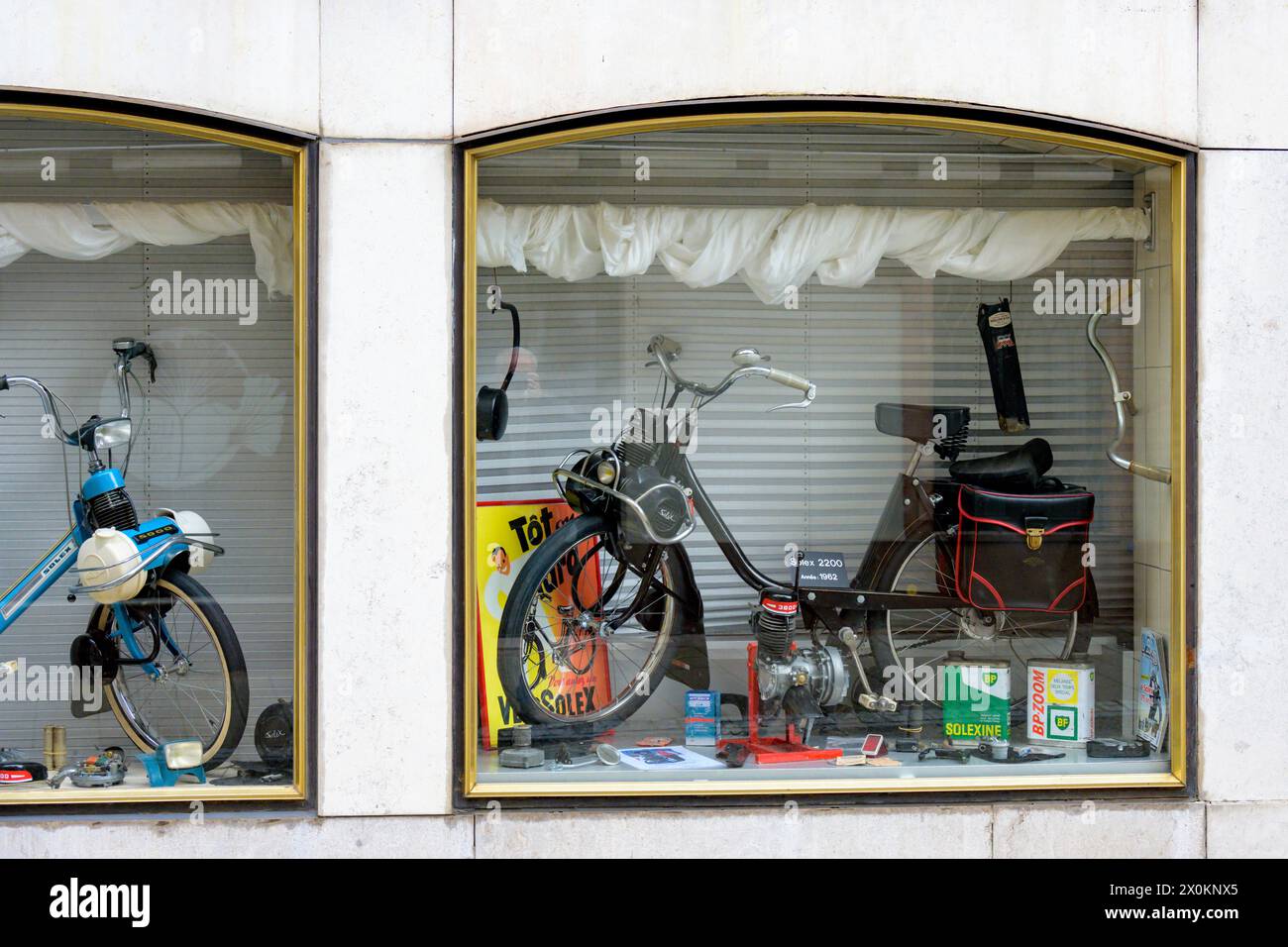 France, Alsace, Wissembourg, Velo Solex in a shop window Stock Photo ...