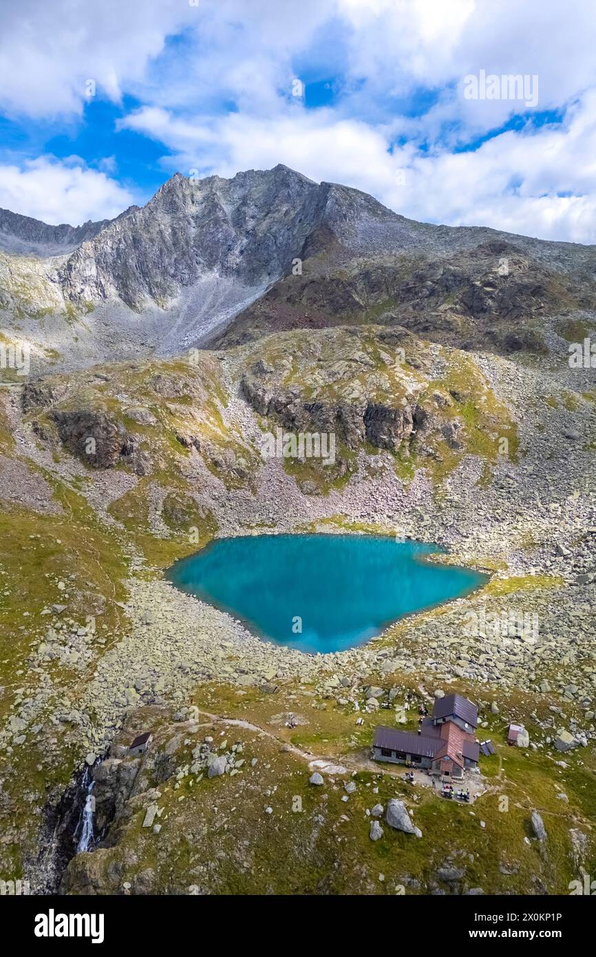 View of the Franco Tonolini refuge and Lake Rotondo in the beautiful ...