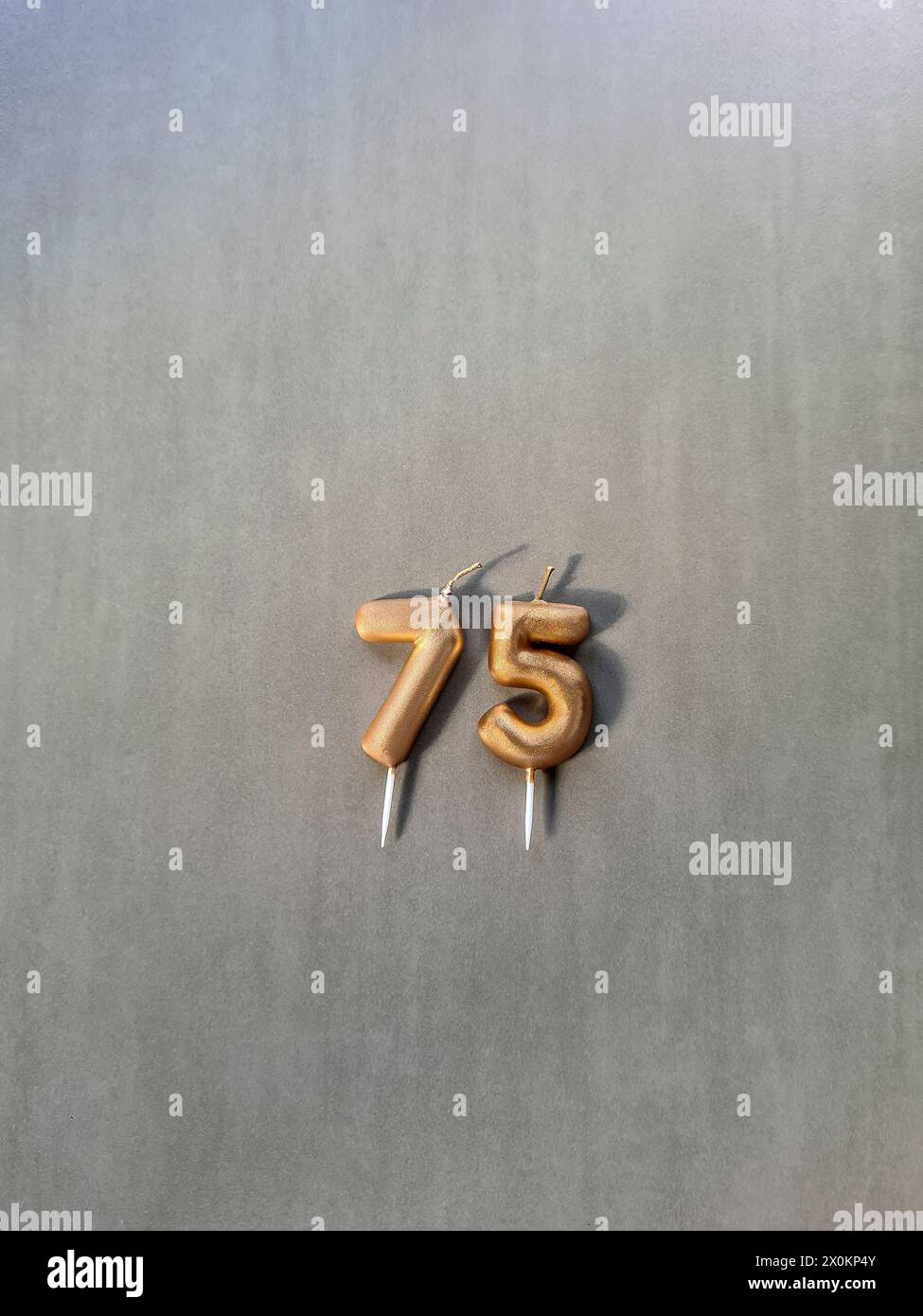 The number 75 as candles for the birthday and anniversary, 75 years of ...