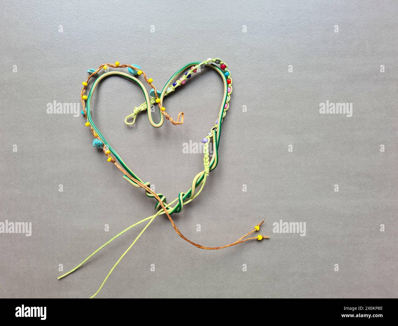 Homemade decorative heart made from bent wire and a small string of ...