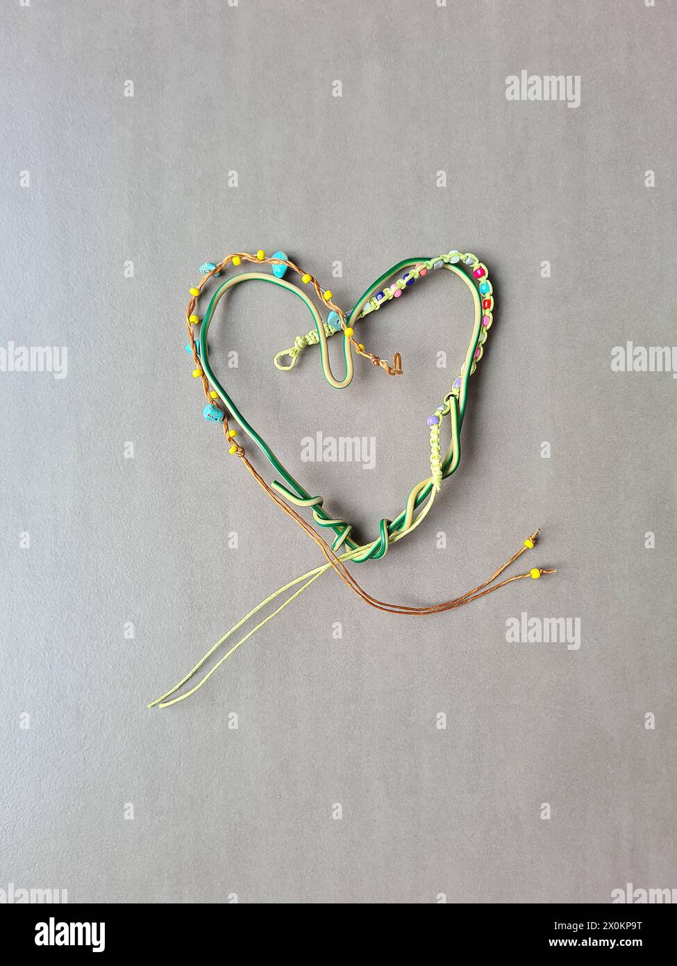 Homemade decorative heart made from bent wire and a small string of ...