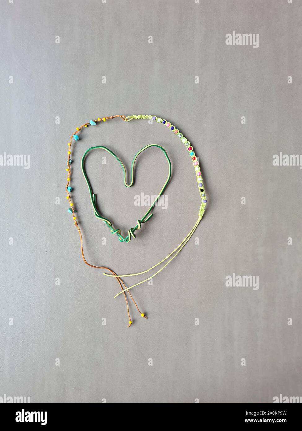 Homemade decorative heart made from bent wire and a small string of ...