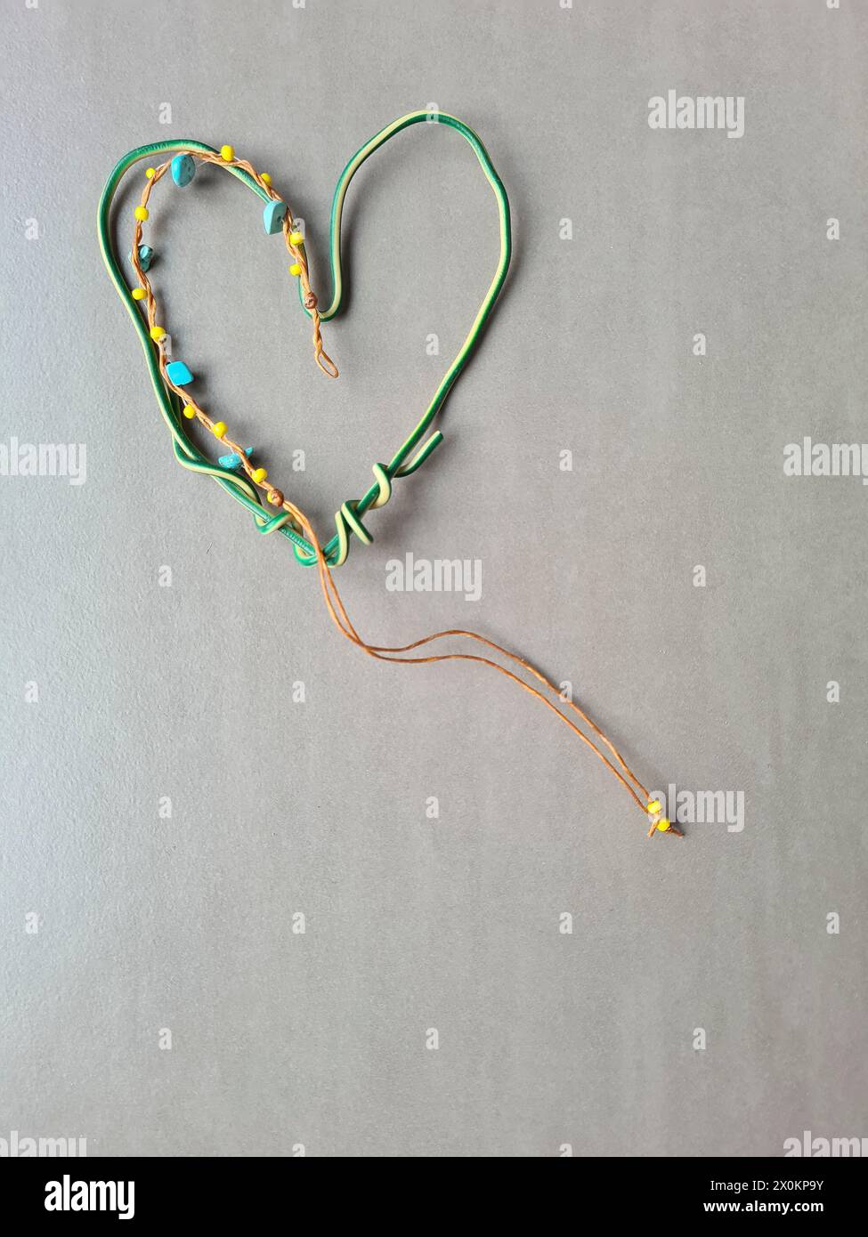Homemade decorative heart made from bent wire and a small string of ...
