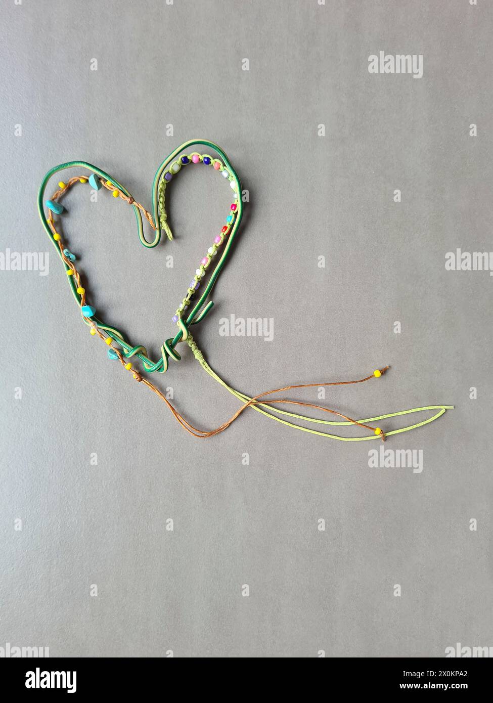 Homemade decorative heart made from bent wire and a small string of ...
