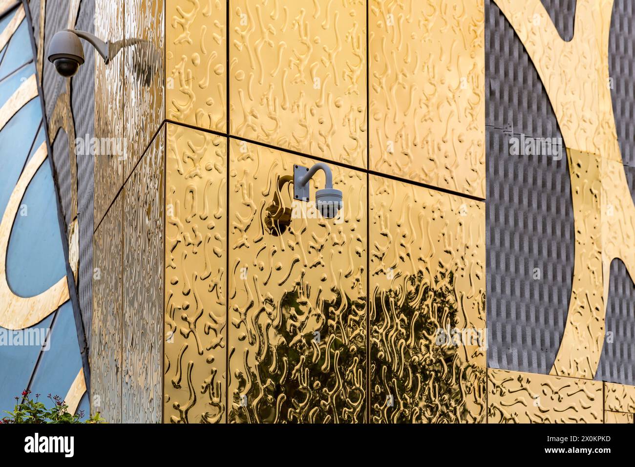 Lighting and gold colored metal facade of the frame hi-res stock ...